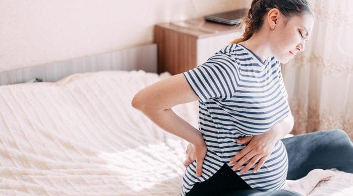 Pregnancy Back Pain Treatment, Causes, Symptoms, and Diagnosis | Airrosti